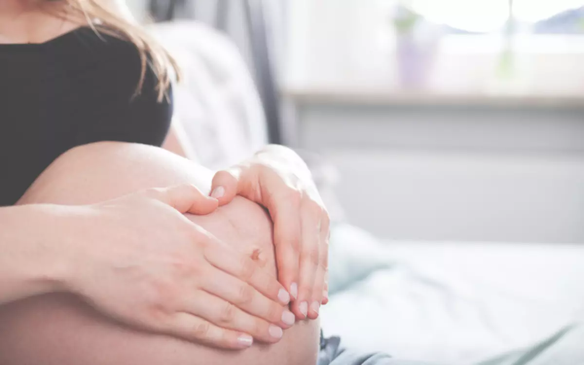 Symphysuit durante o embarazo: síntomas, tratamento que perigosas, razóns