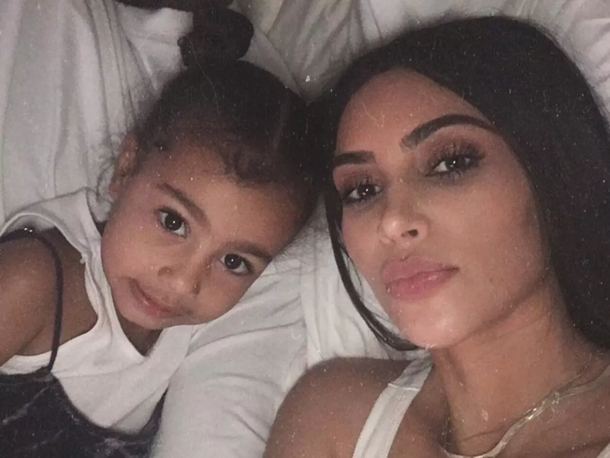 Mother's daughters: Kim and Chloy Kardashian with children