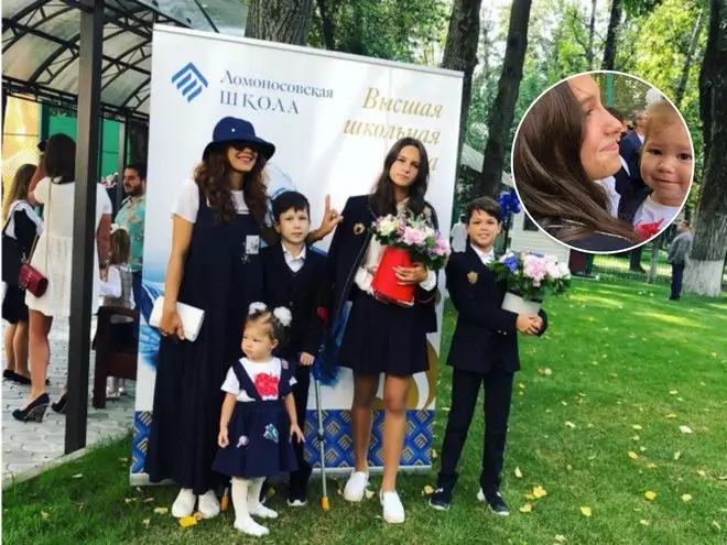 Ekaterina Klimova with all children on the school line September 1